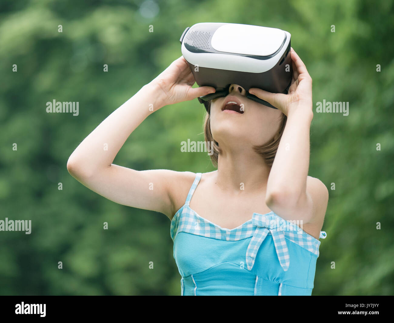 Girl with VR glasses Stock Photo - Alamy