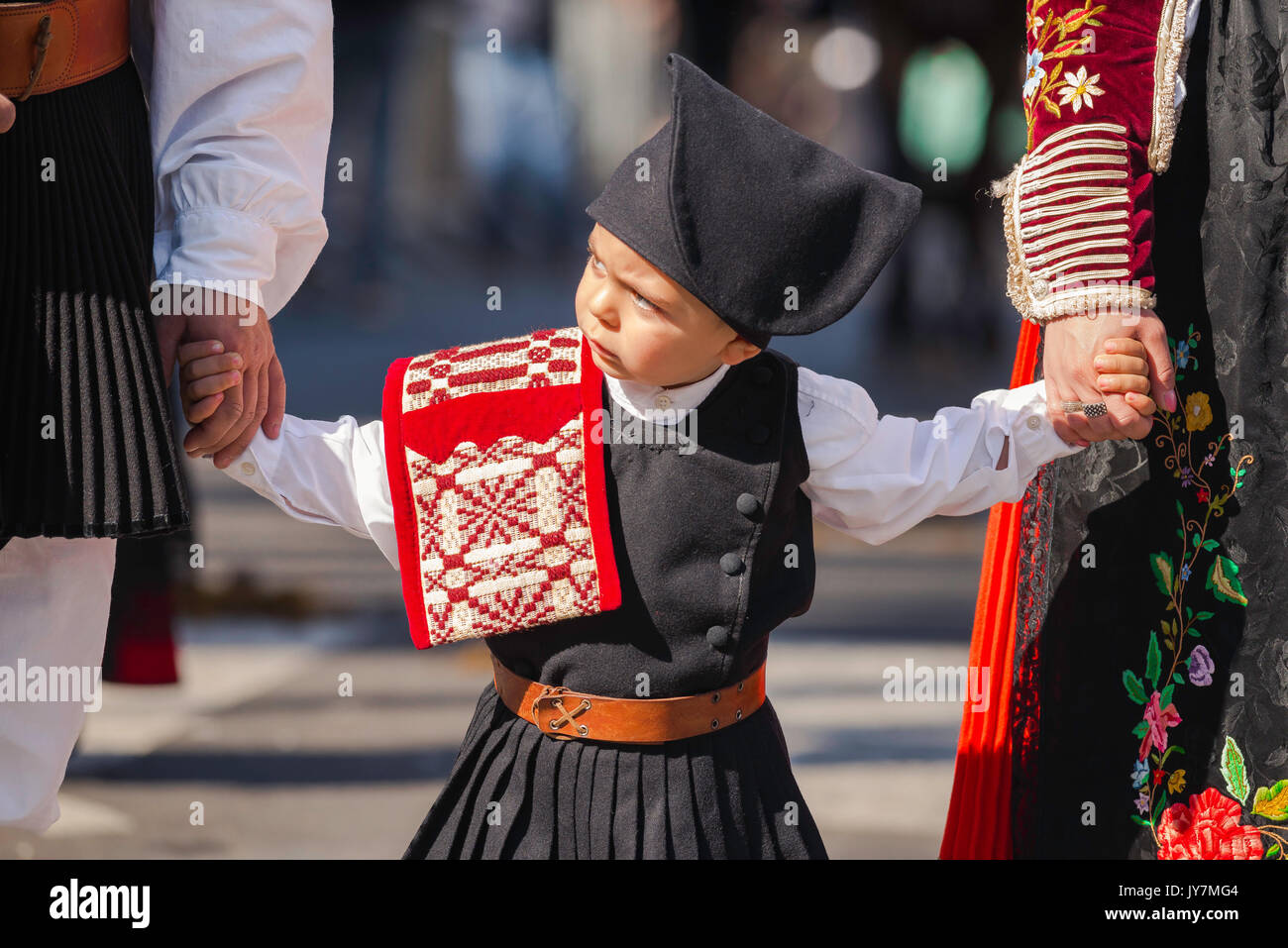 Sardinia child, view of a child dressed in traditional costume, holding ...