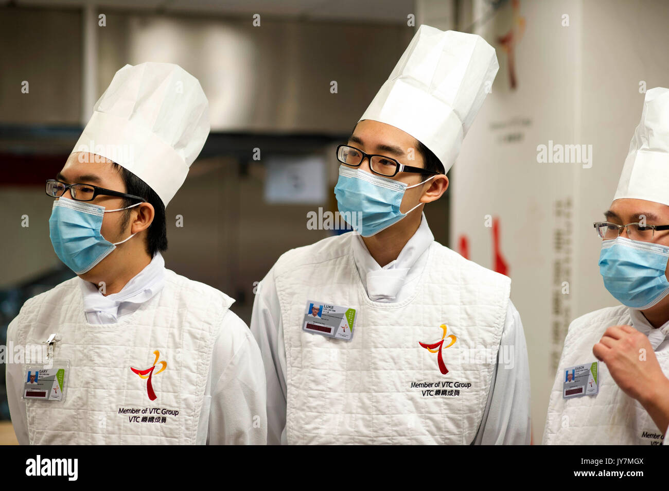 student chefs wearing face masks at Hong Kong Culinary Academy kitchen ...
