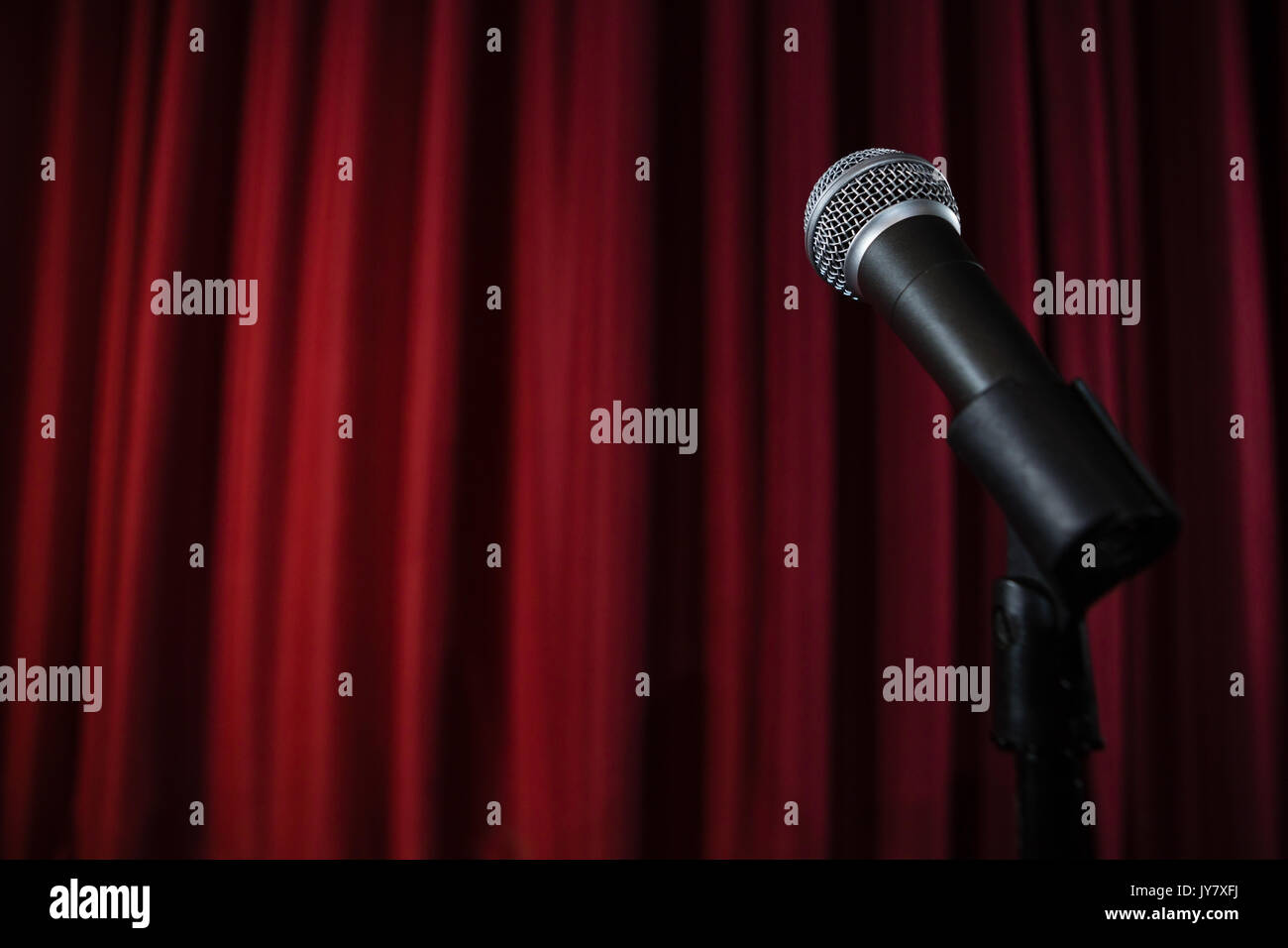 Microphone on stage in theatre Stock Photo - Alamy