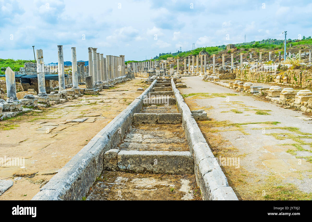 The ancient stone canal for water starts at the Nymphaeum fountain and ...