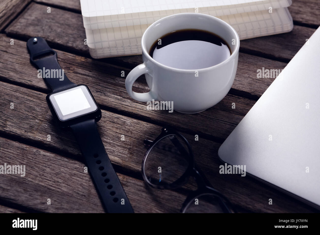 Spectacles smart watch wooden table hi-res stock photography and images ...