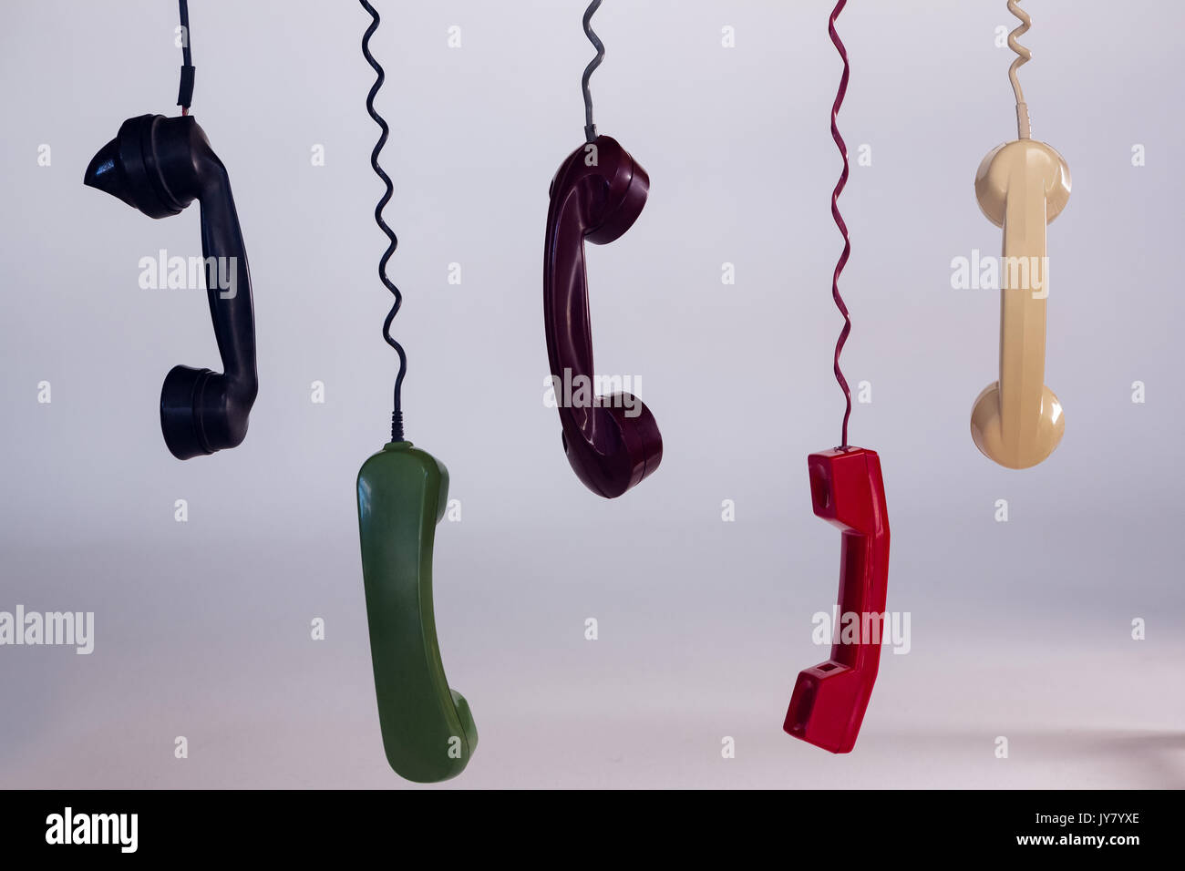 Red telephone receiver hanging hi-res stock photography and images - Alamy