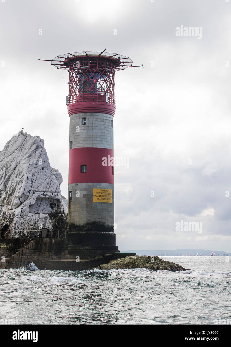 The Needles rocks and lighthouse at the westernmost tip of the Isle of ...