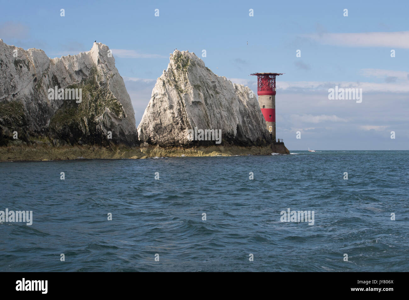 The Needles rocks and lighthouse at the westernmost tip of the Isle of ...