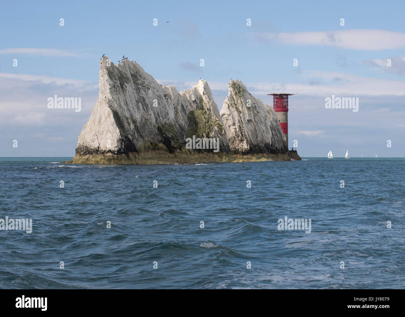 The Needles rocks and lighthouse at the westernmost tip of the Isle of ...