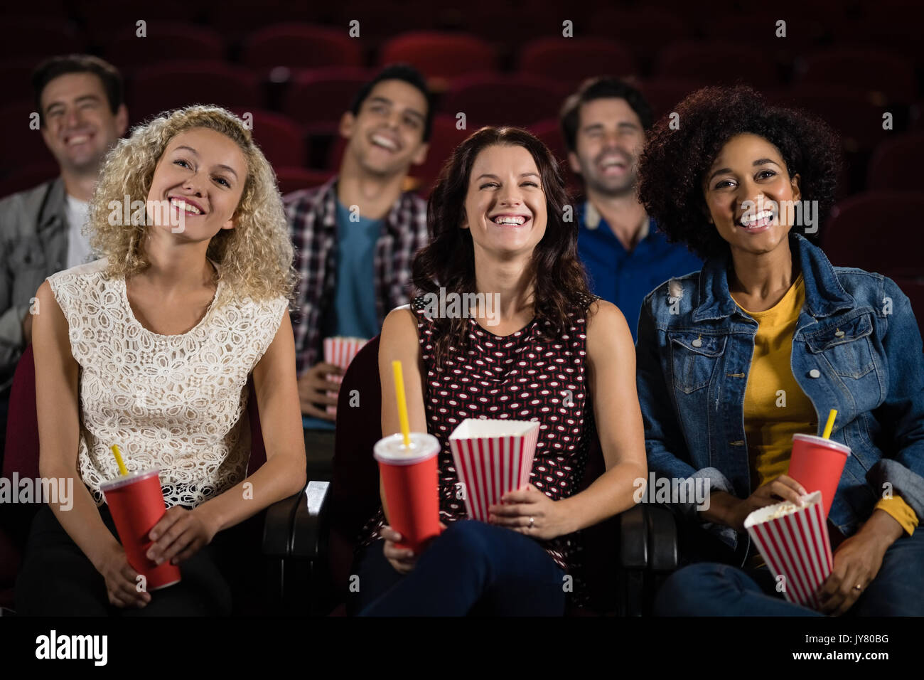 Group of people watching movie in theatre Stock Photo - Alamy