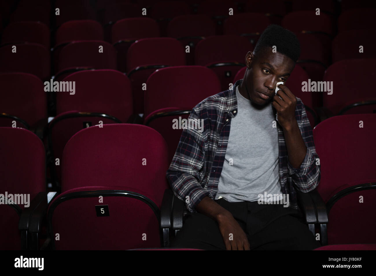 Man crying tears cinema hi-res stock photography and images - Alamy