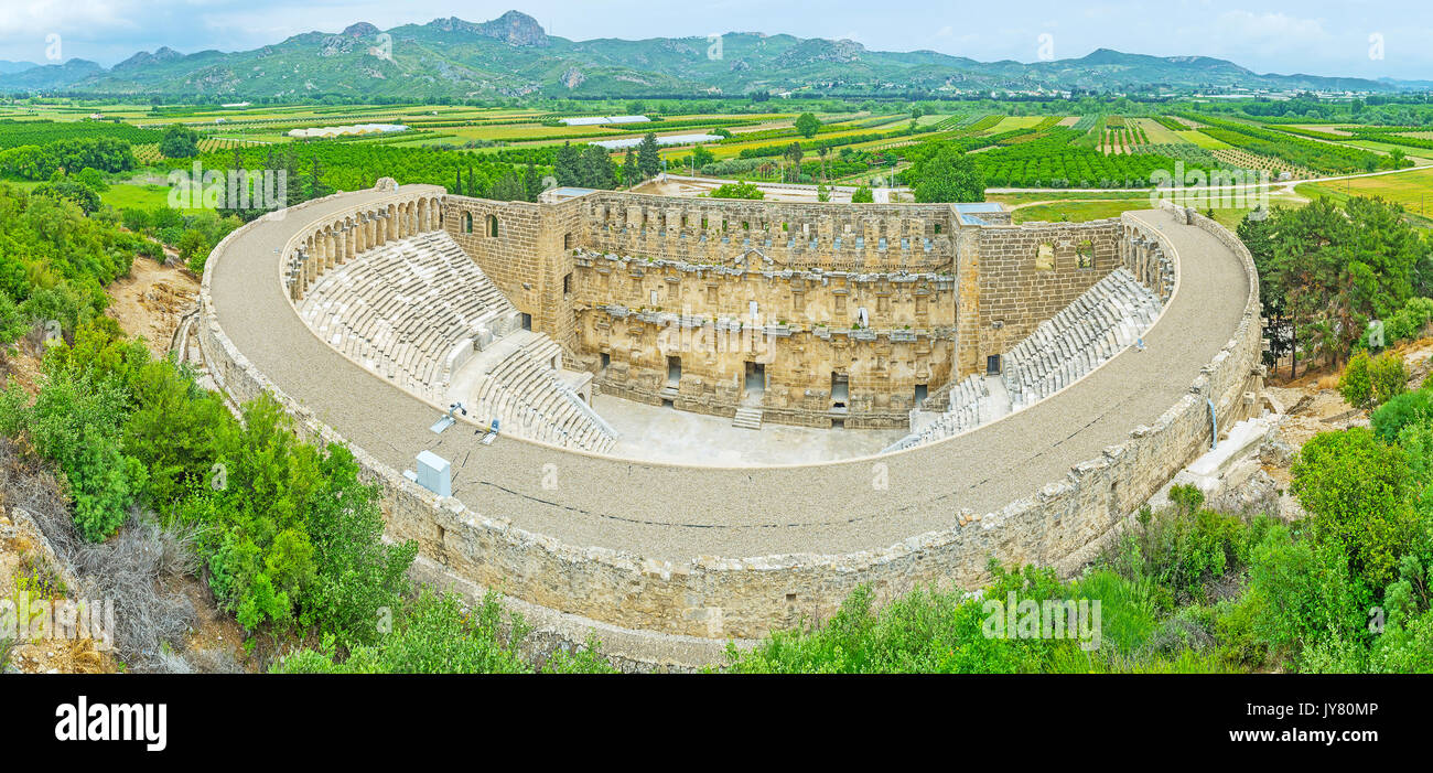The hill surrounds ancient Aspendos amphitheater and helps to overlook ...