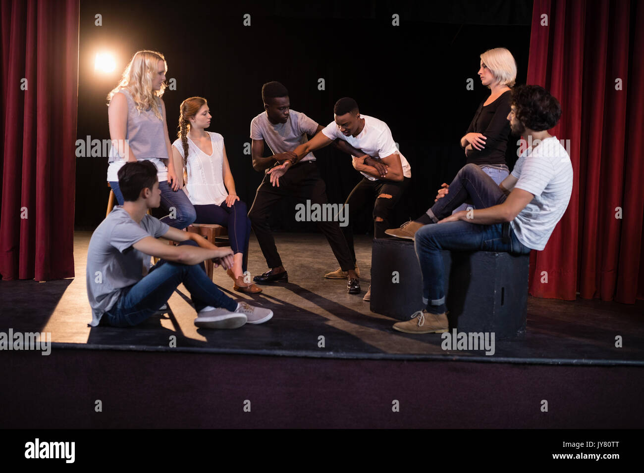 Actors practicing play on stage in theatre Stock Photo - Alamy