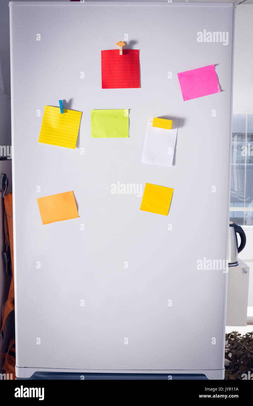 Sticky notes stuck on refrigerator Stock Photo - Alamy