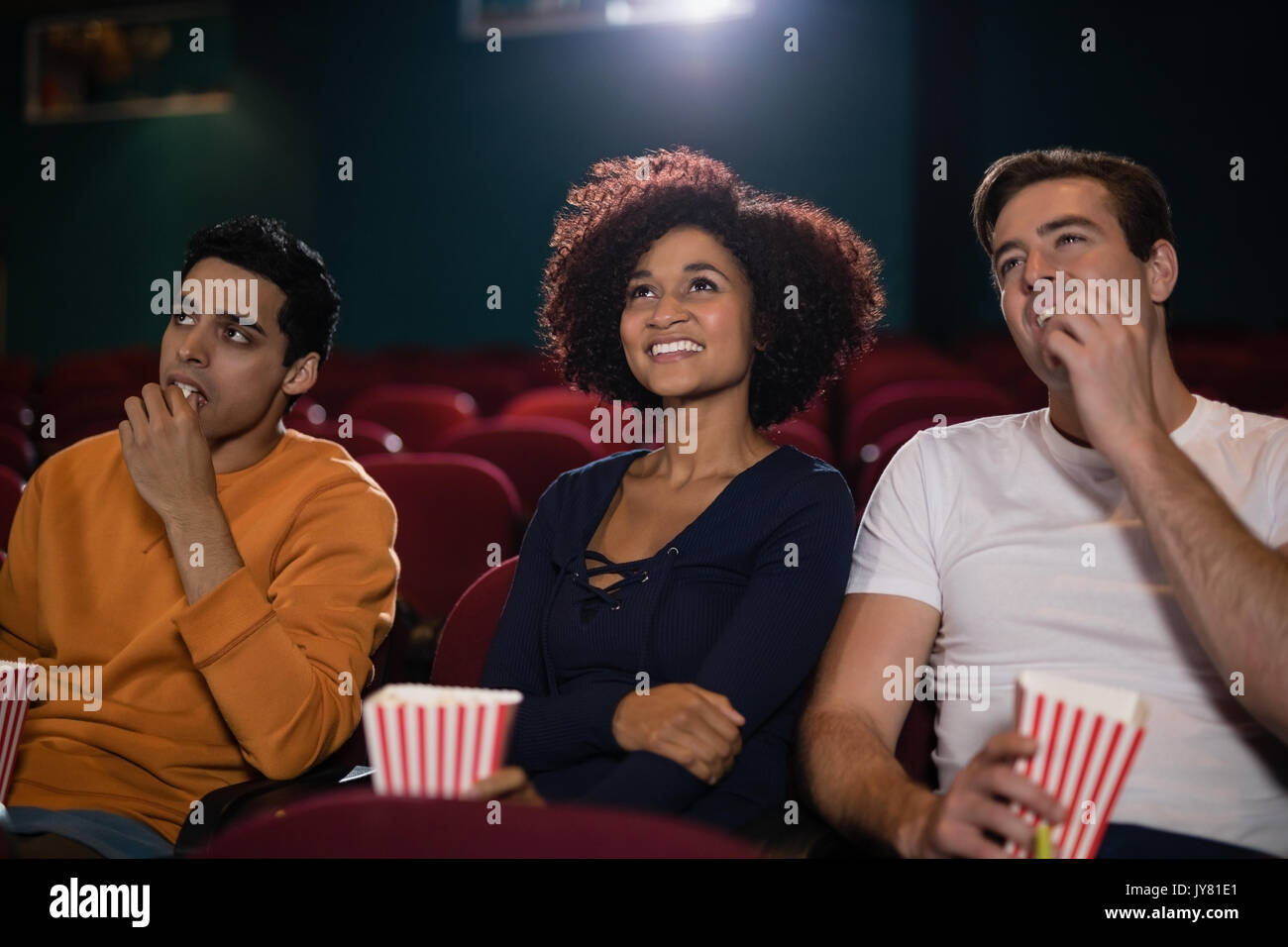 Group of people watching movie in theatre Stock Photo - Alamy