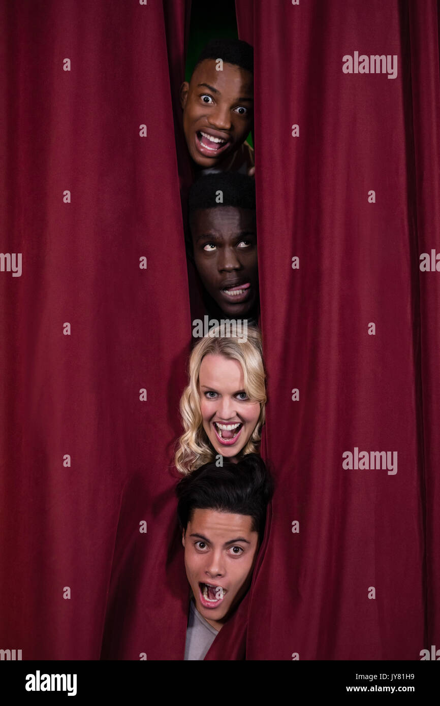 Man hiding behind curtains hi-res stock photography and images - Alamy