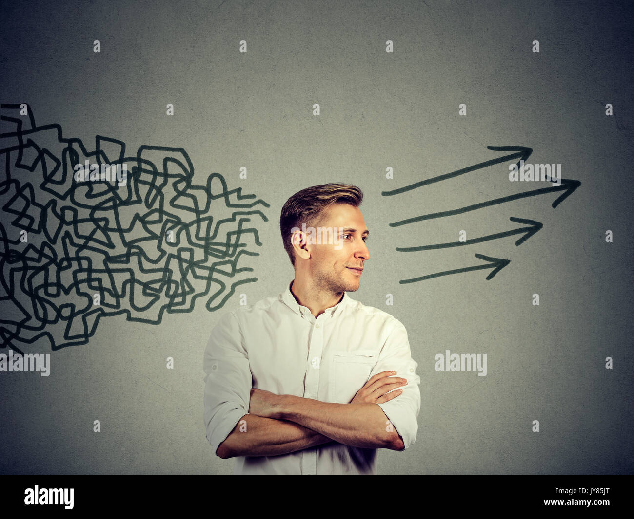 Side profile young man looking at his side getting his thought together ...