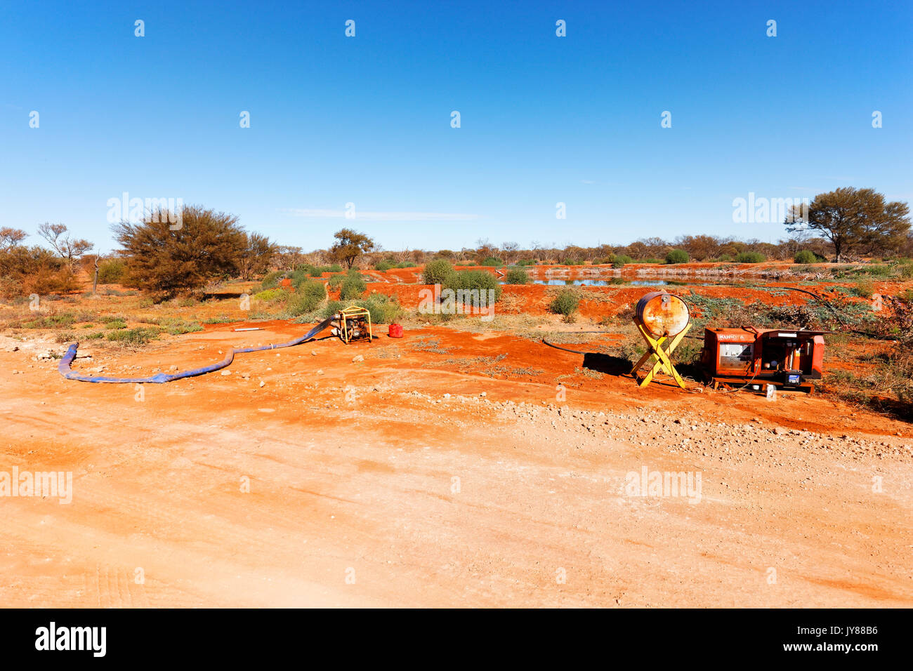 Water pumps alongside dam in outback, Murchison, Western Australia ...