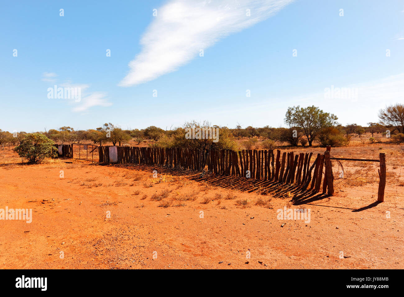 Old wood fence and gate, on the old wool pathway in Australian outback ...