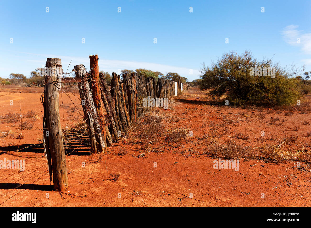 Old wood fence and gate, on the old wool pathway in Australian outback ...