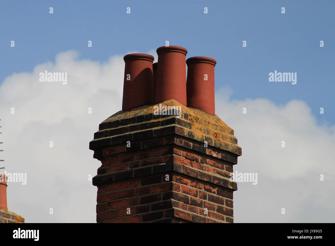 Brick house chimney tv aerial hi-res stock photography and images - Alamy