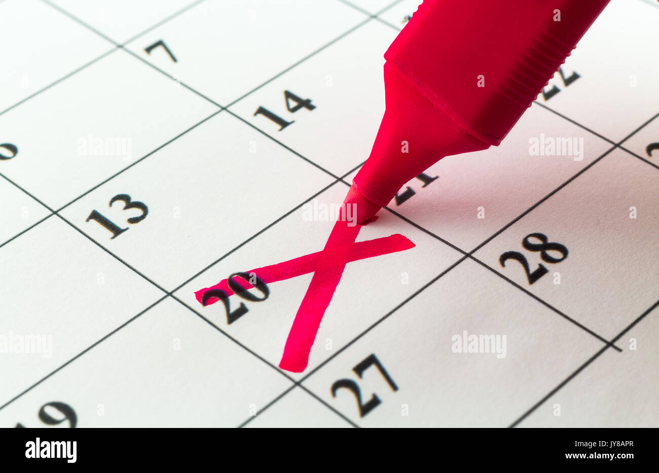 Calendar with red marker Stock Photo - Alamy