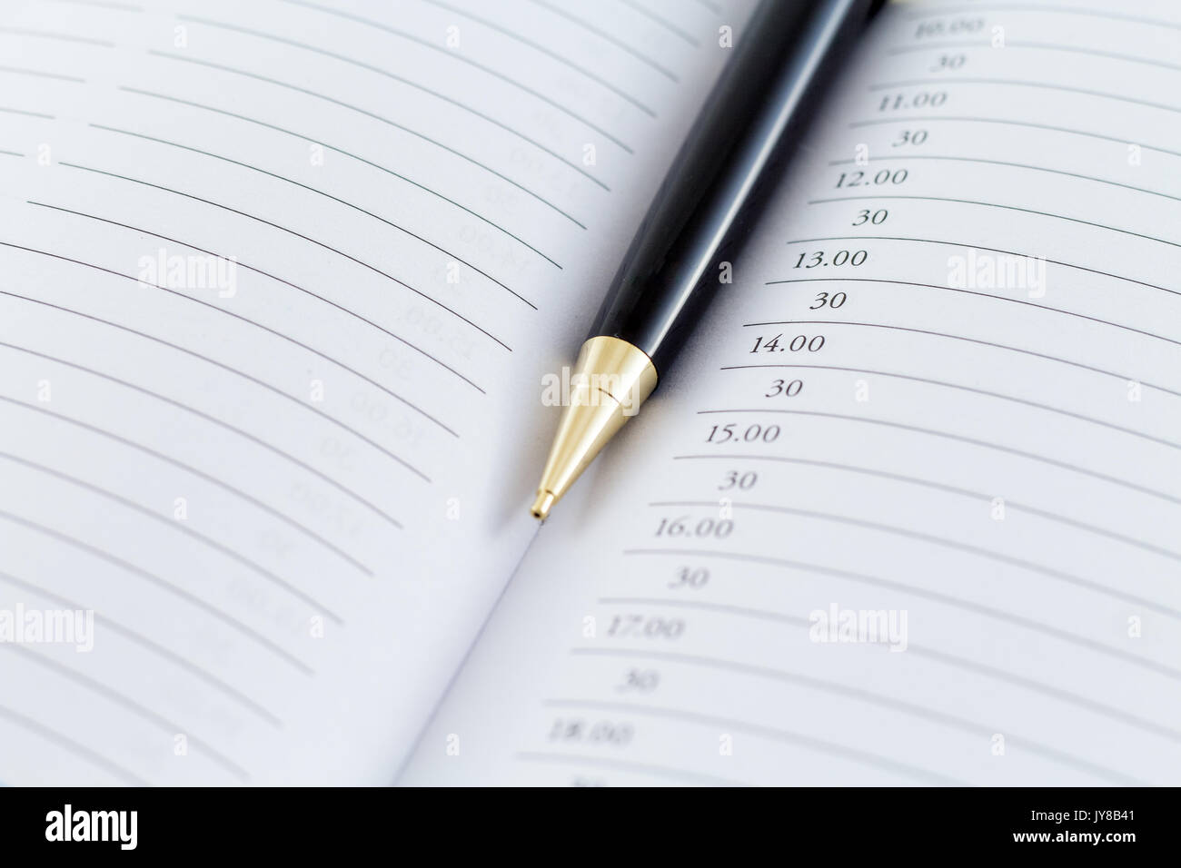 agenda diary page planner day date with pen Stock Photo - Alamy