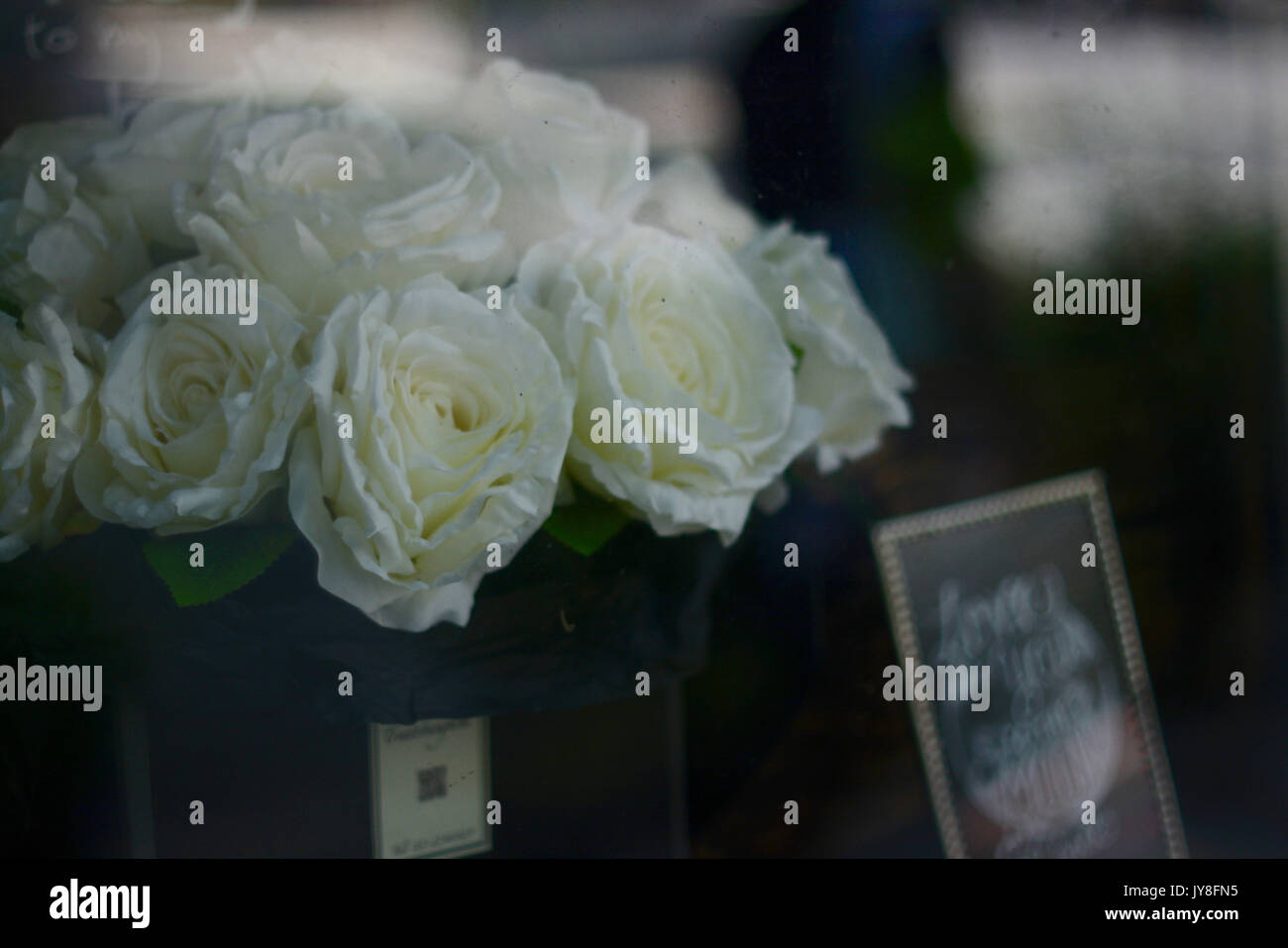 bouquet white rose and picture frame with vintage style Stock Photo - Alamy