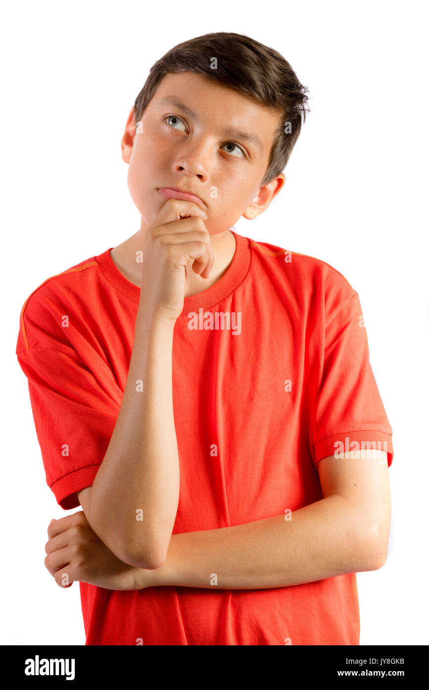 Young teenage boy isolated on white thinking Stock Photo - Alamy