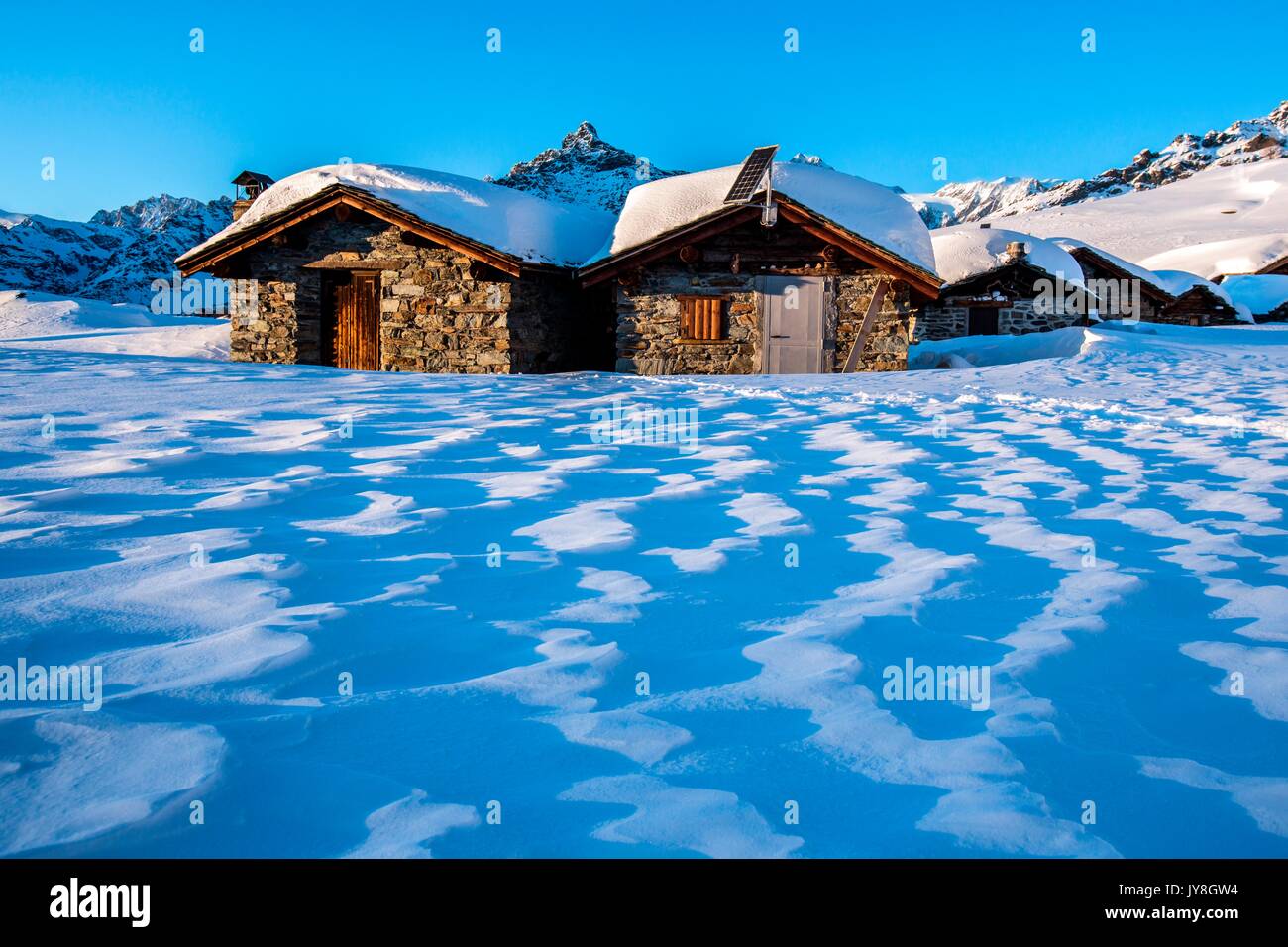 Shapes in the snow designed by a winter wind at the Alpe Prabello ...