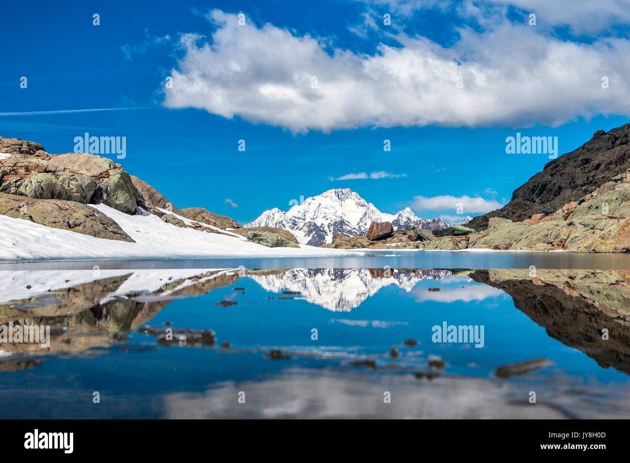 Mount Disgrazia reflected in Lake Campagneda, Valmalenco, Valtellina ...