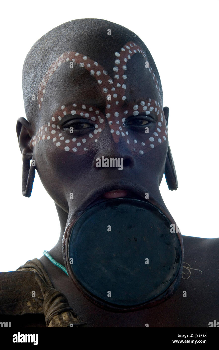 Young Woman with clay lip plate and face painted, Mursi Tribe, Mago ...