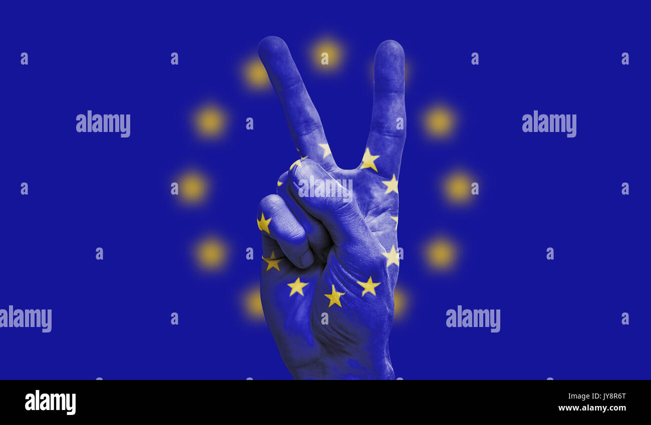 European Union national flag painted onto a male hand showing a victory ...