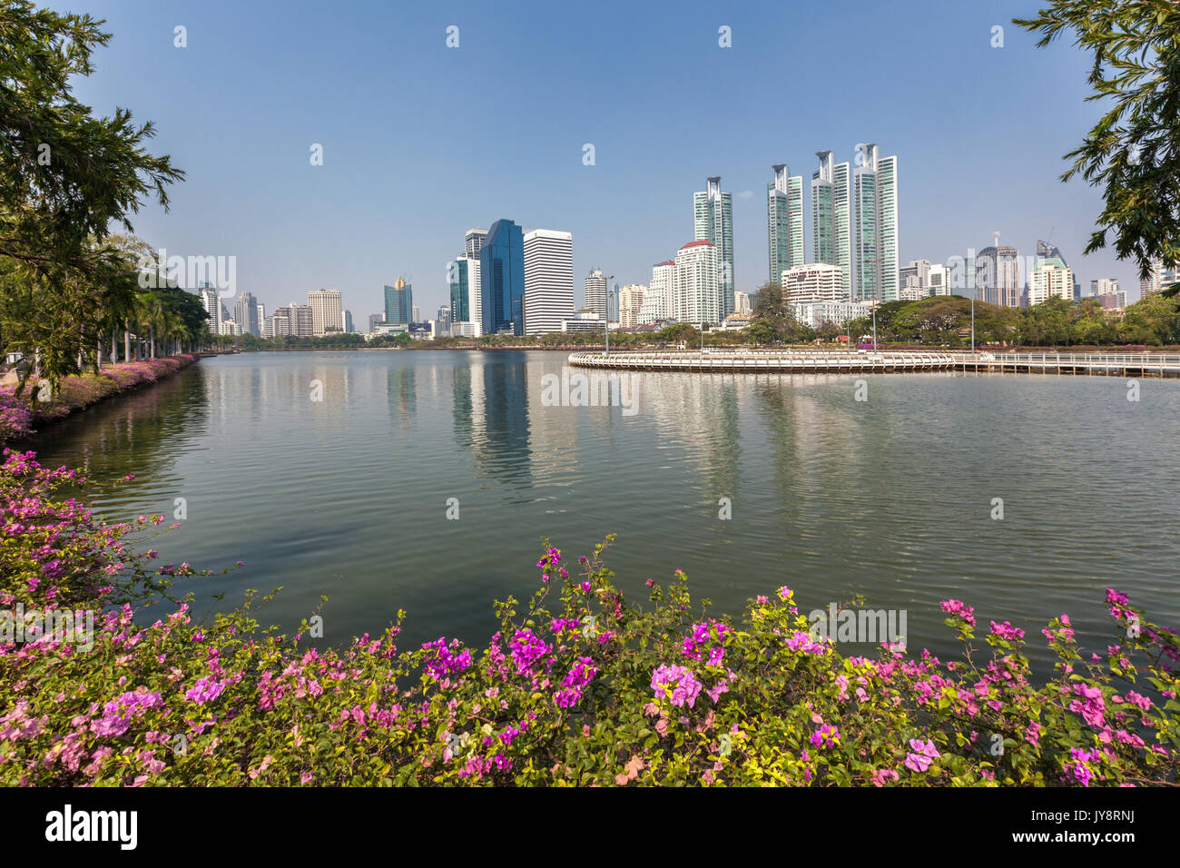 Benjakiti Park in Bangkok, Thailand skyline with Lake Ratchada ...