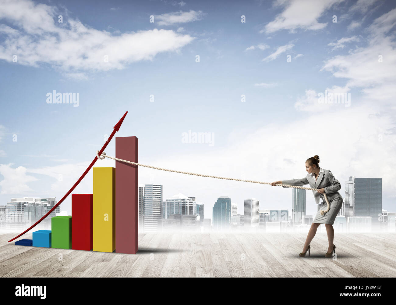 Businesswoman pulling graph with rope as concept of power and control ...