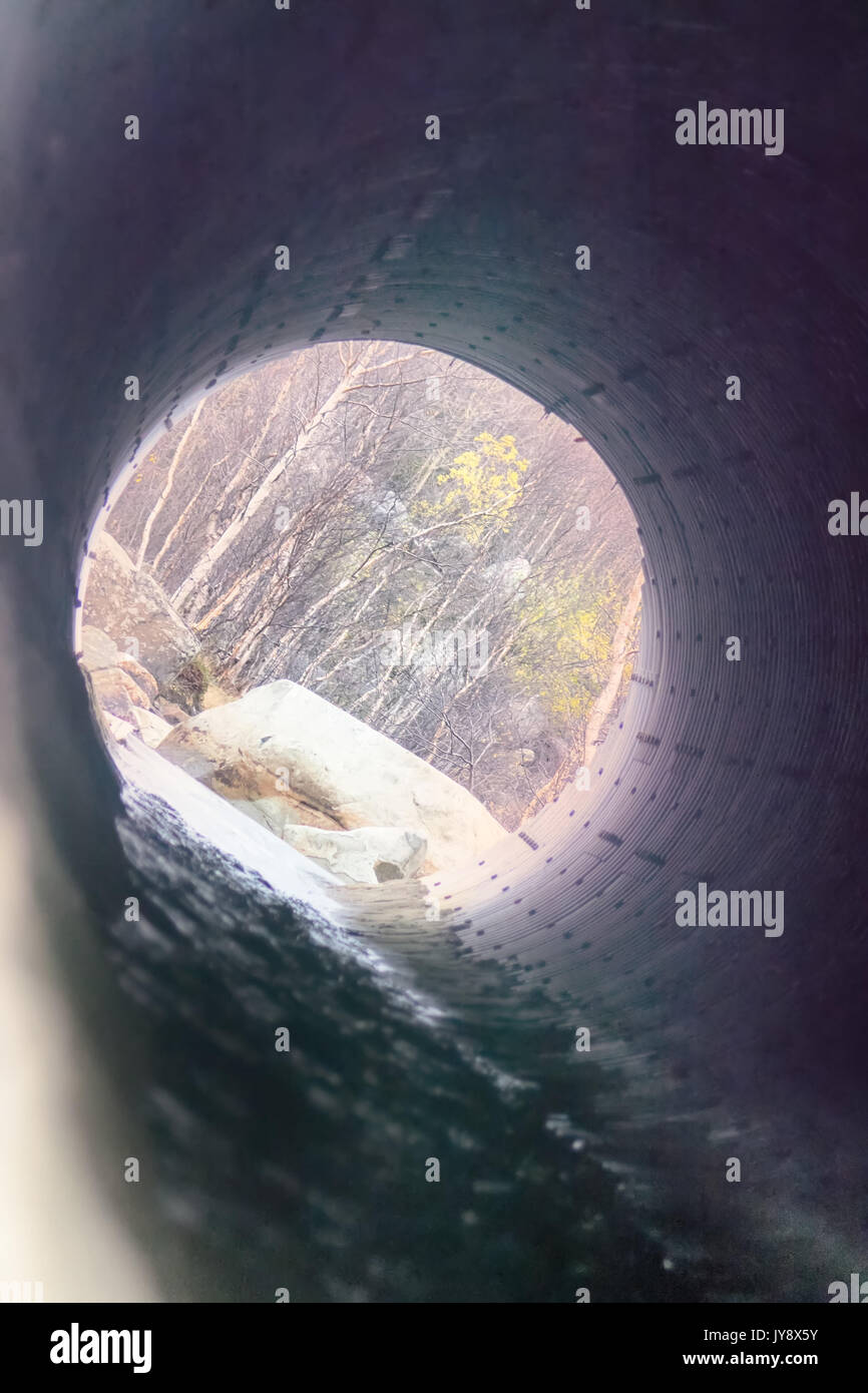 Culvert - drain under road for small river. Big pipe under freeway ...