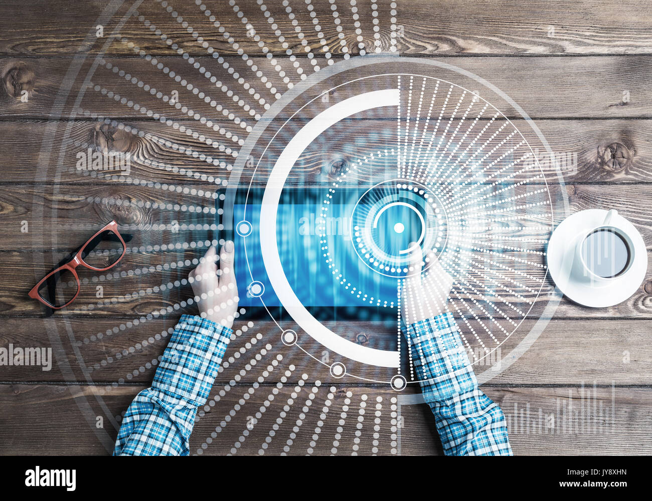 Business workplace with tablet device coffee cup and media interface ...