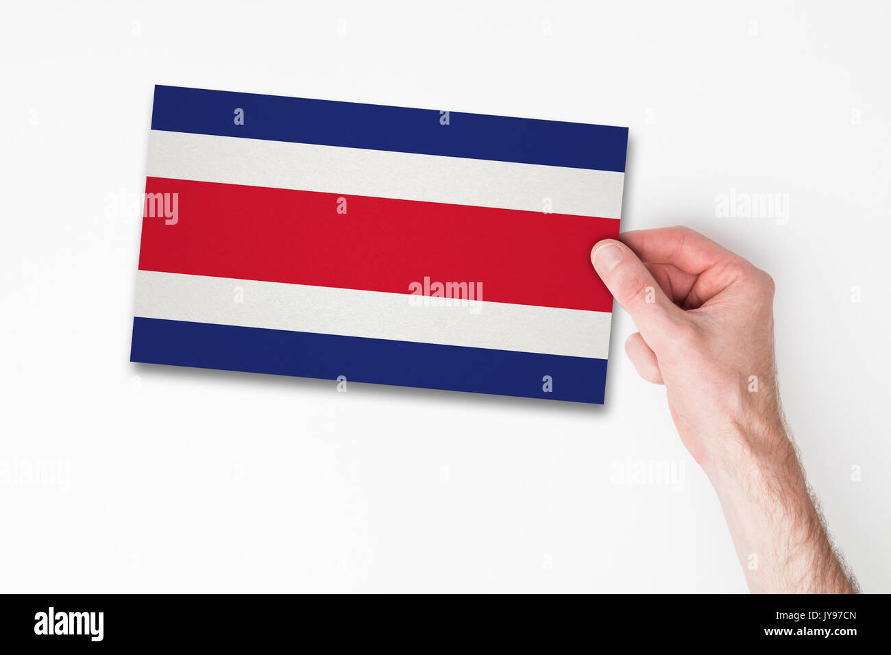 Male hand holding costa rica flag Stock Photo - Alamy