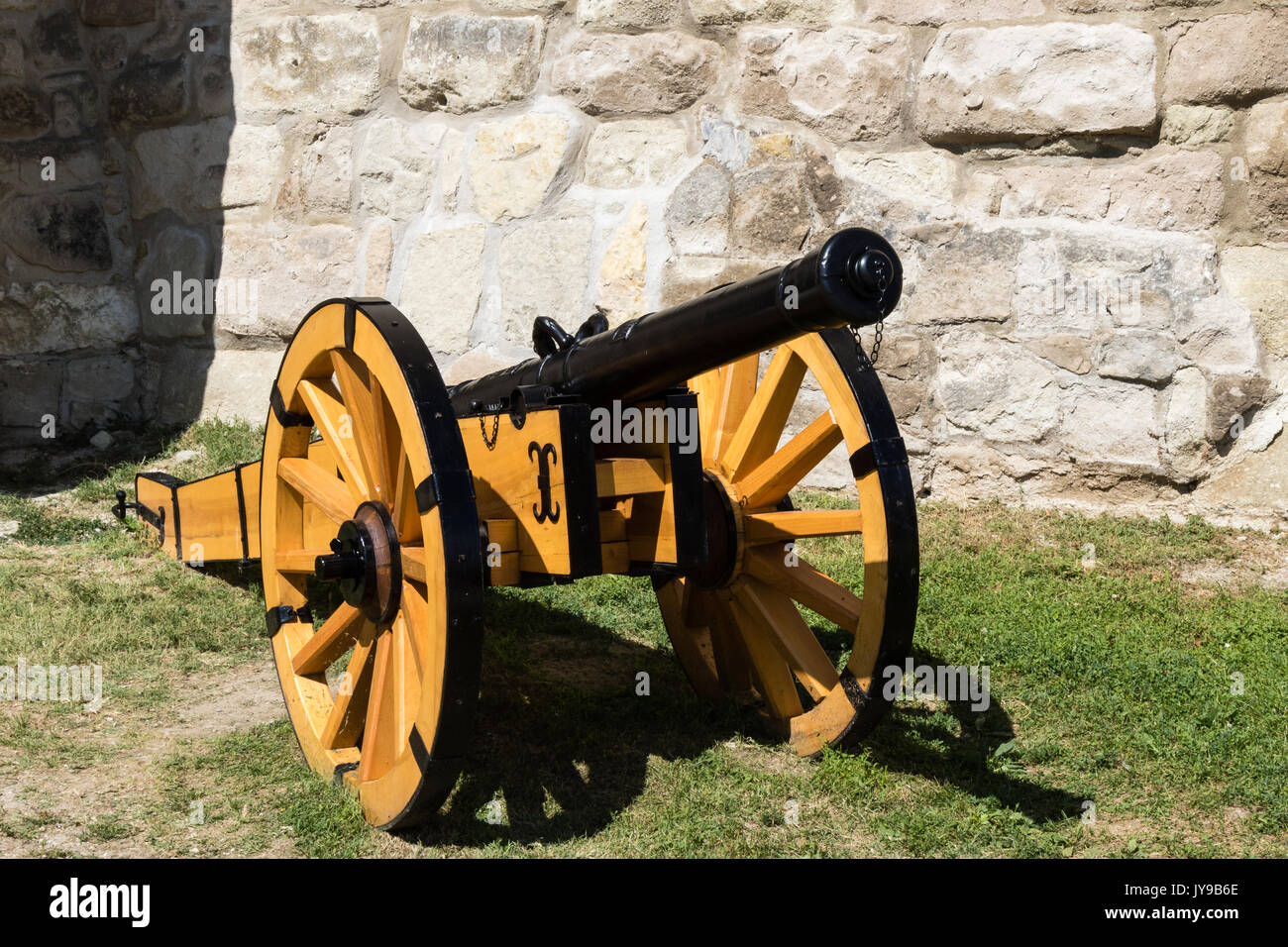 old historical metal and wood fire canon Stock Photo - Alamy