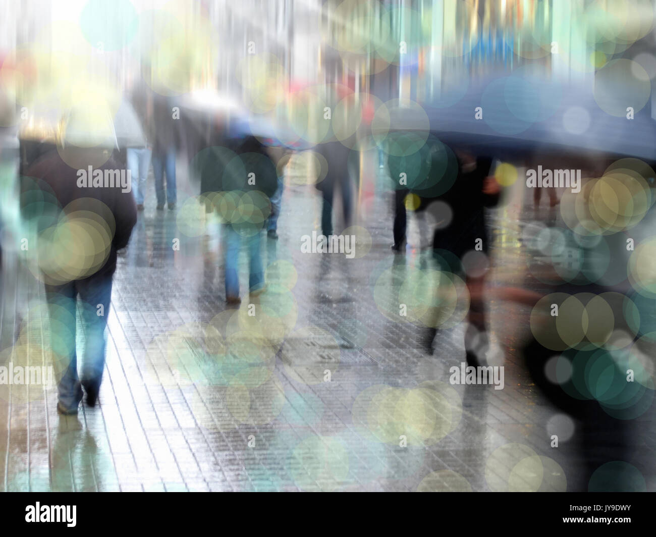 blurry background image of people walking on busy street Stock Photo ...