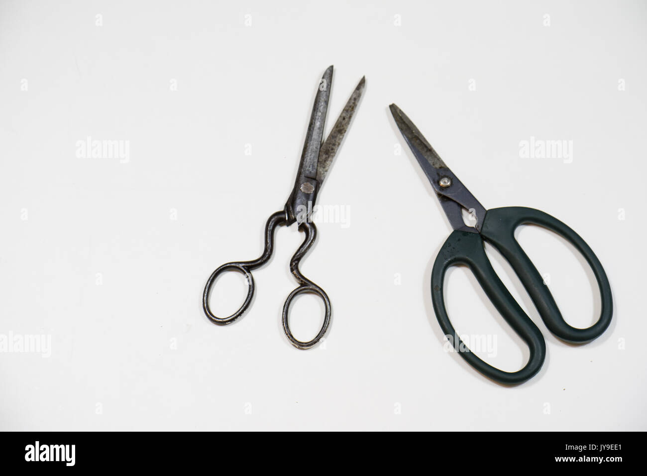 Old paper cutting scissors on a white background. Tailoring and ...