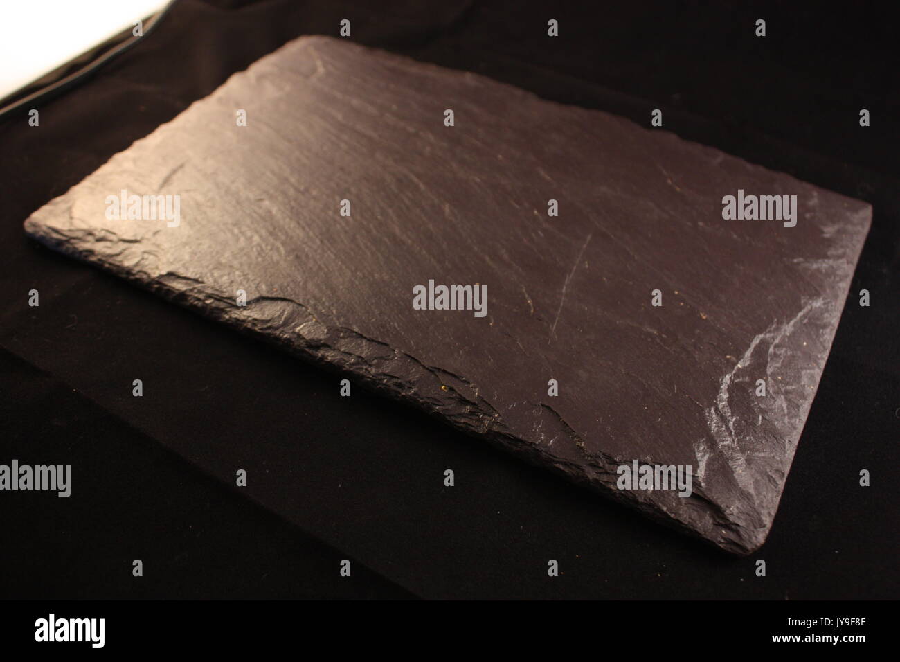 Slate chopping board Stock Photo - Alamy