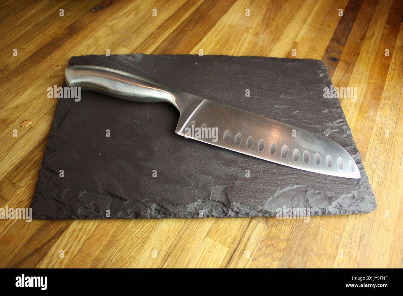 Sharp knife of slate board Stock Photo - Alamy