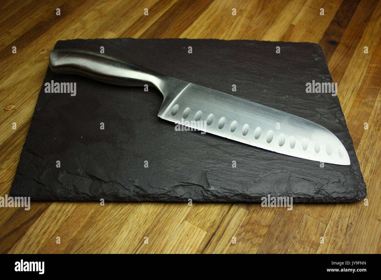 Sharp knife of slate board Stock Photo - Alamy