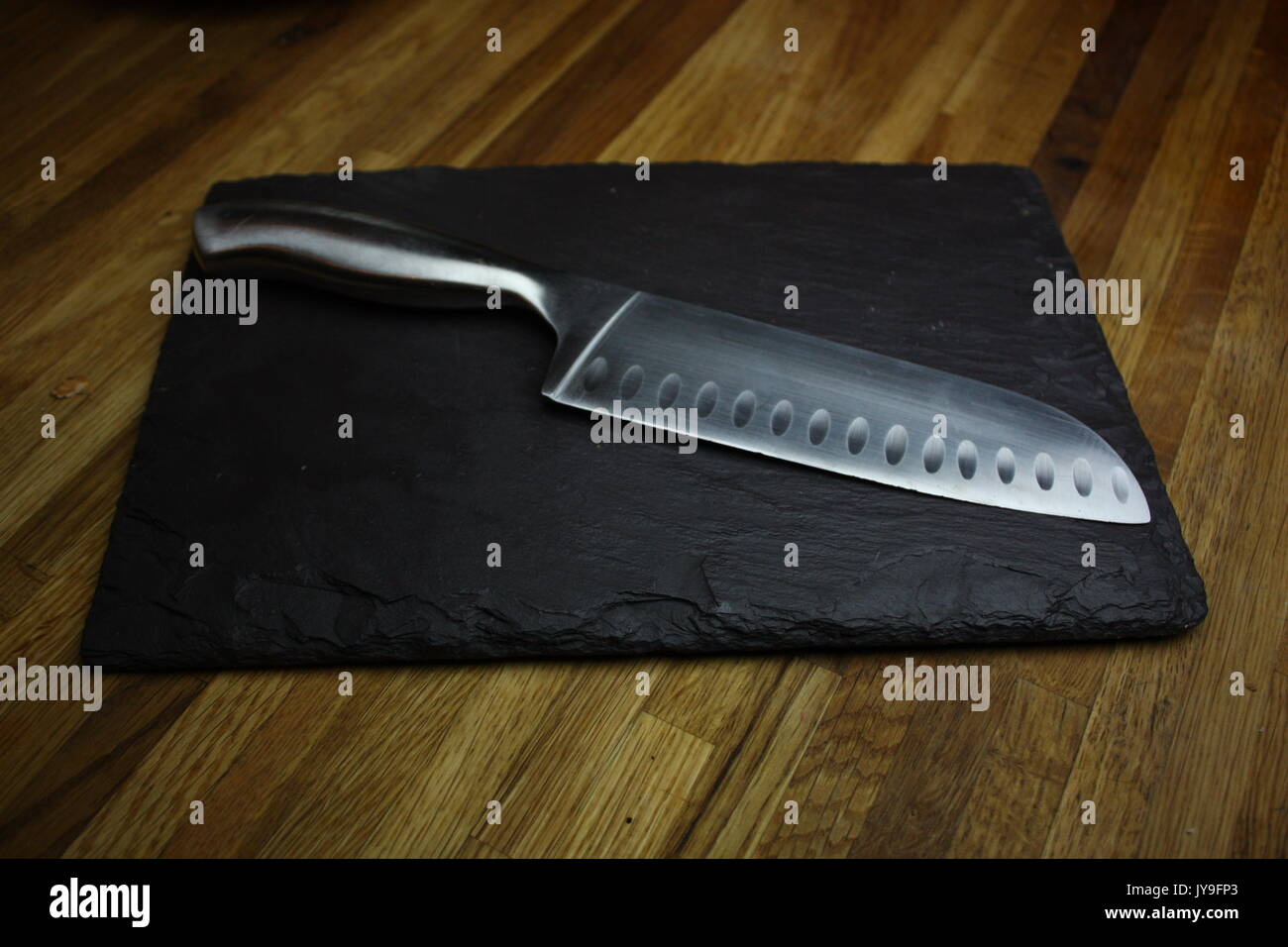 Sharp knife of slate board Stock Photo - Alamy