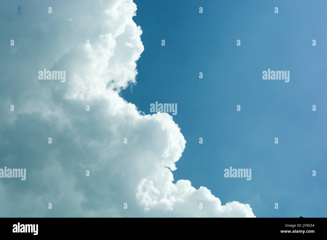 Clouds side with sky background Stock Photo - Alamy