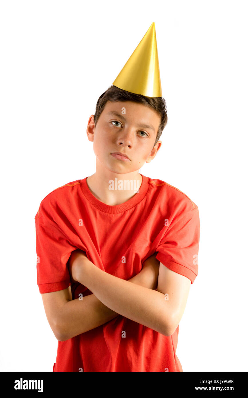 Young teenage boy isolated on white looking annoyed at a party Stock ...