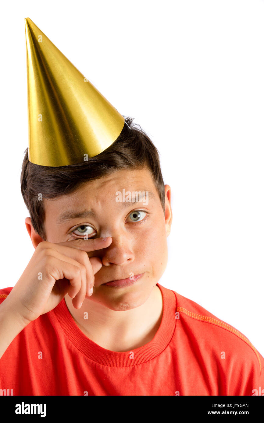 Young teenage boy isolated on white crying at a party Stock Photo - Alamy