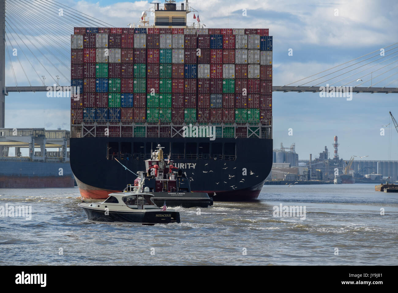 Savannah, Georgia USA -- November 9, 2014 A Giant Cargo Ship steams up ...