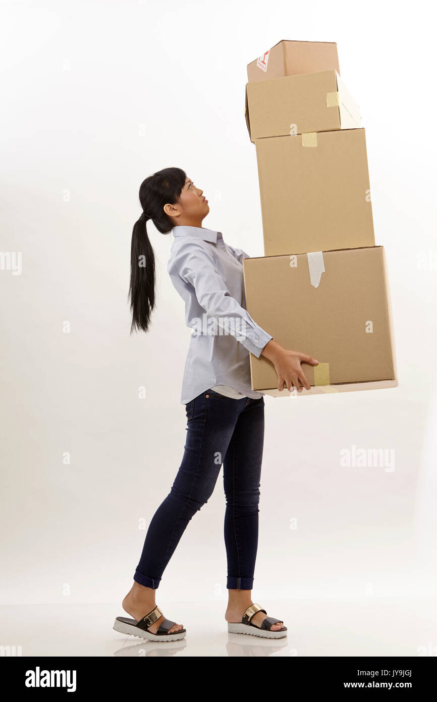 asian woman carrying stack of boxes Stock Photo - Alamy