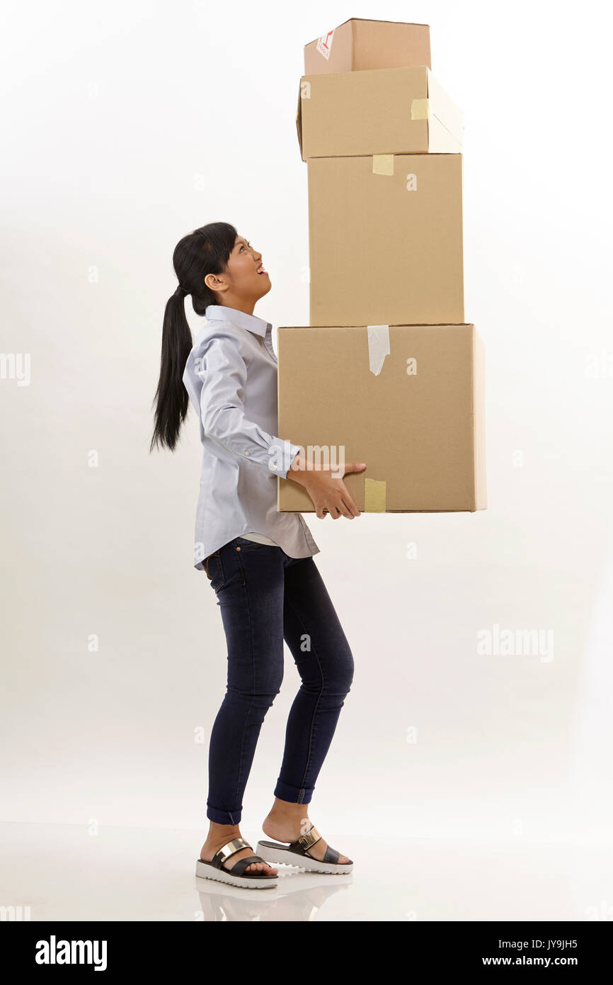 asian woman carrying stack of boxes Stock Photo - Alamy