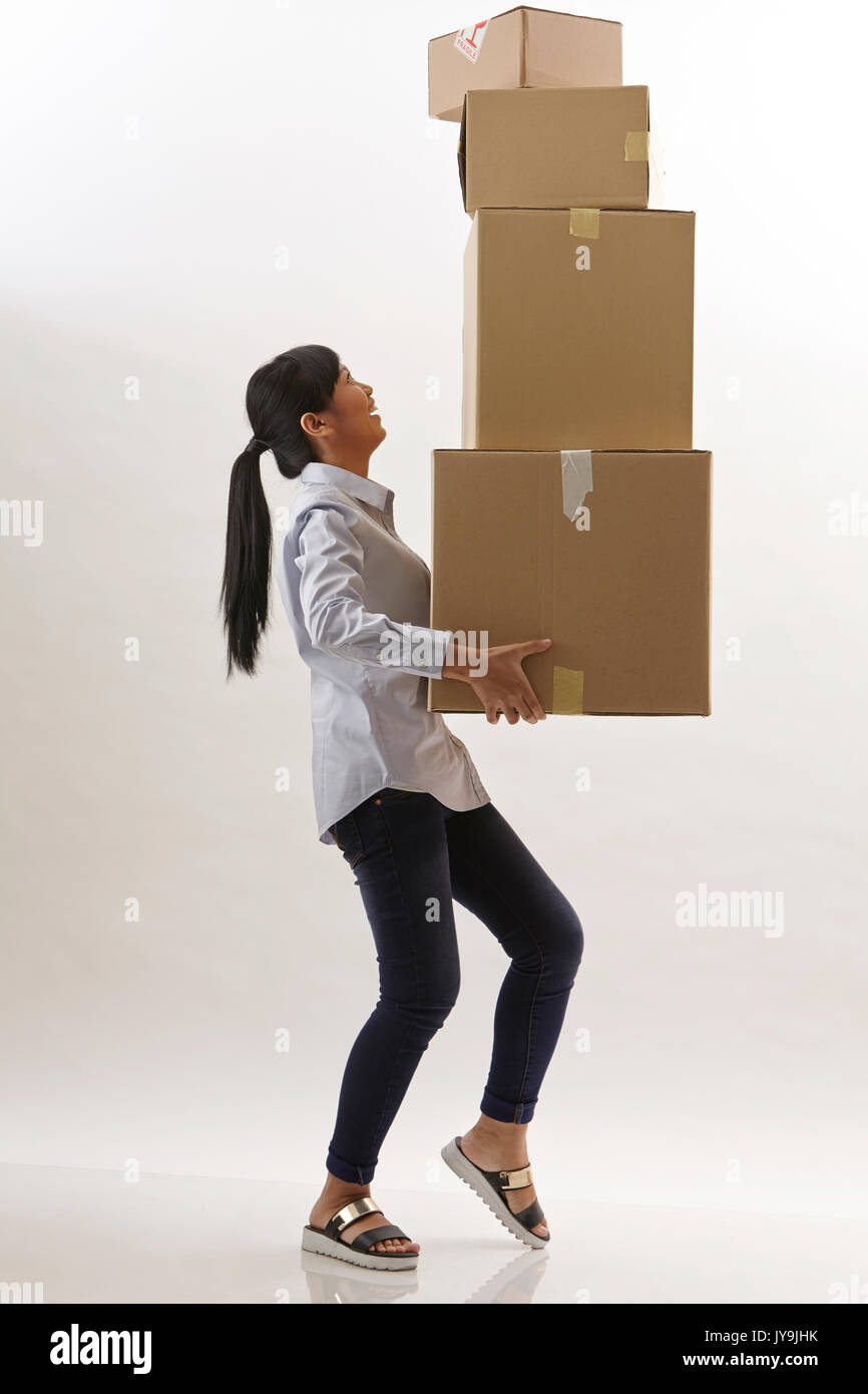 asian woman carrying stack of boxes Stock Photo - Alamy