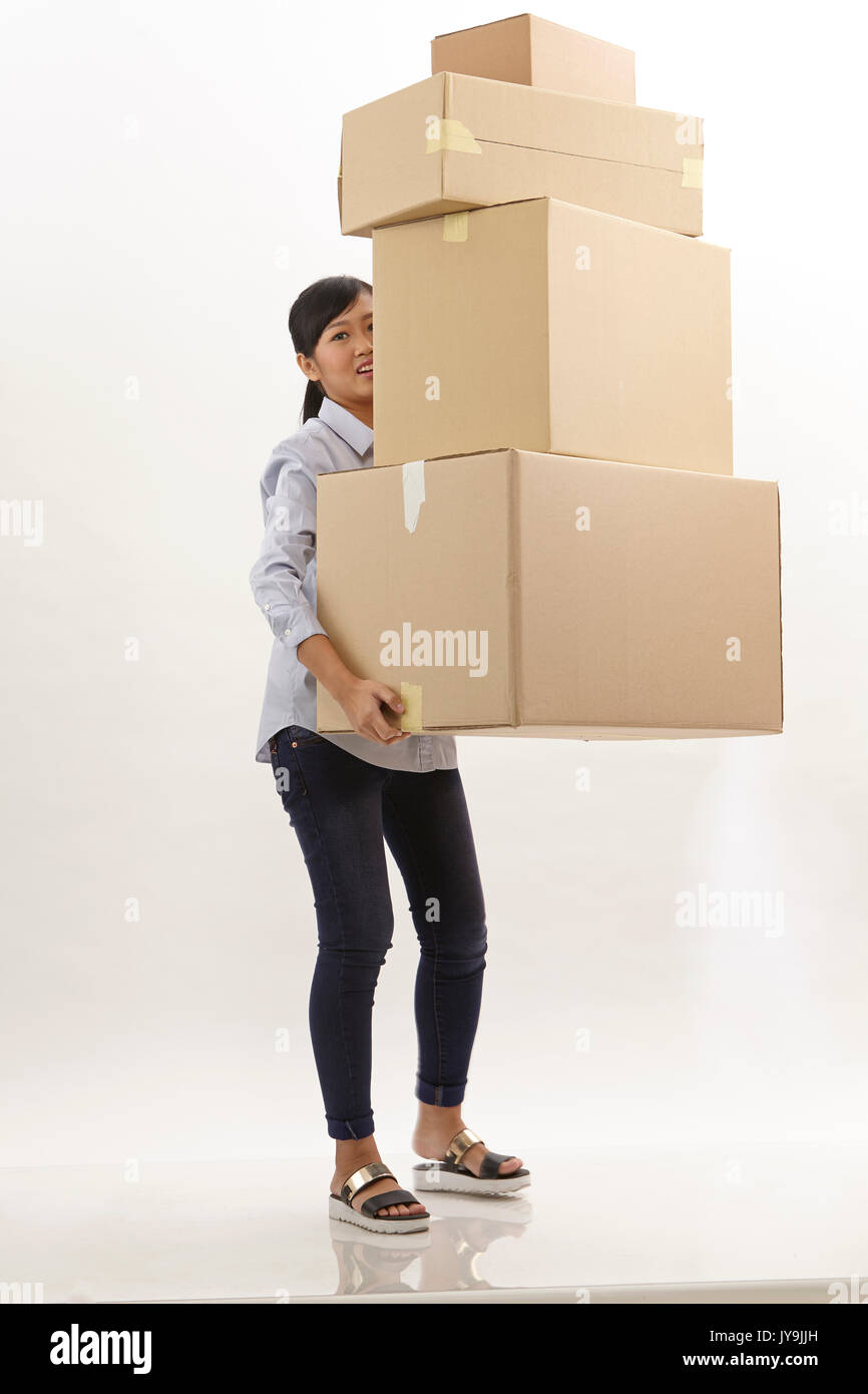 asian woman carrying stack of boxes Stock Photo - Alamy